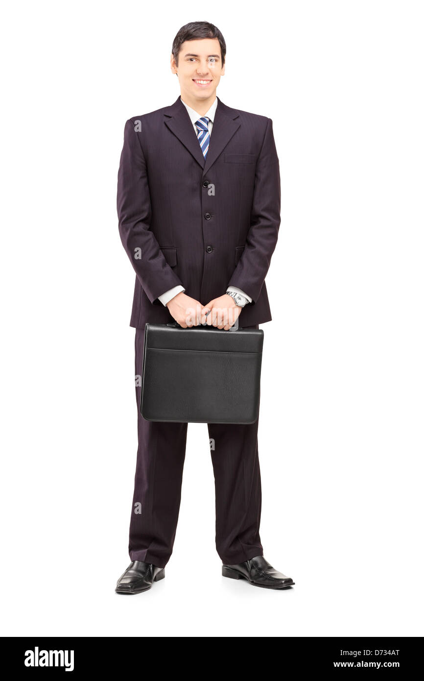 Full length portrait of a young businessman with a briefcase posing ...