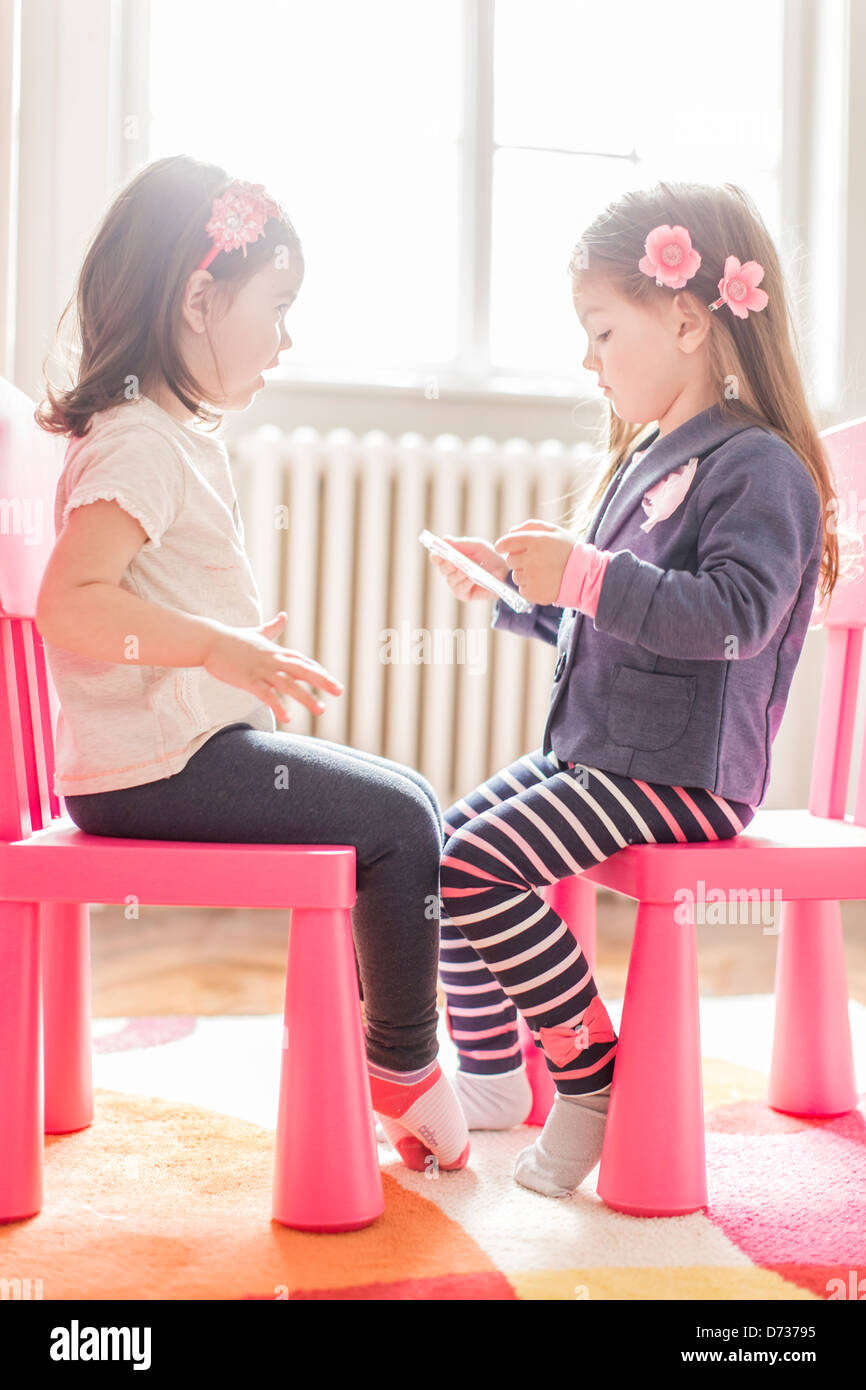 Two girls playing Stock Photo - Alamy