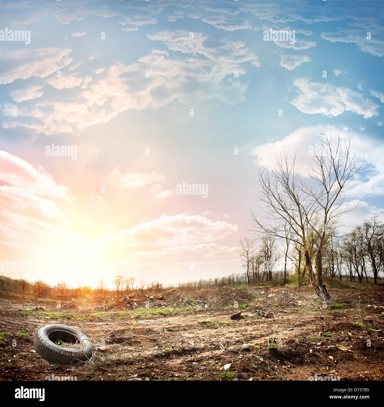 Garbage dump on the background of evening sunlight Stock Photo - Alamy