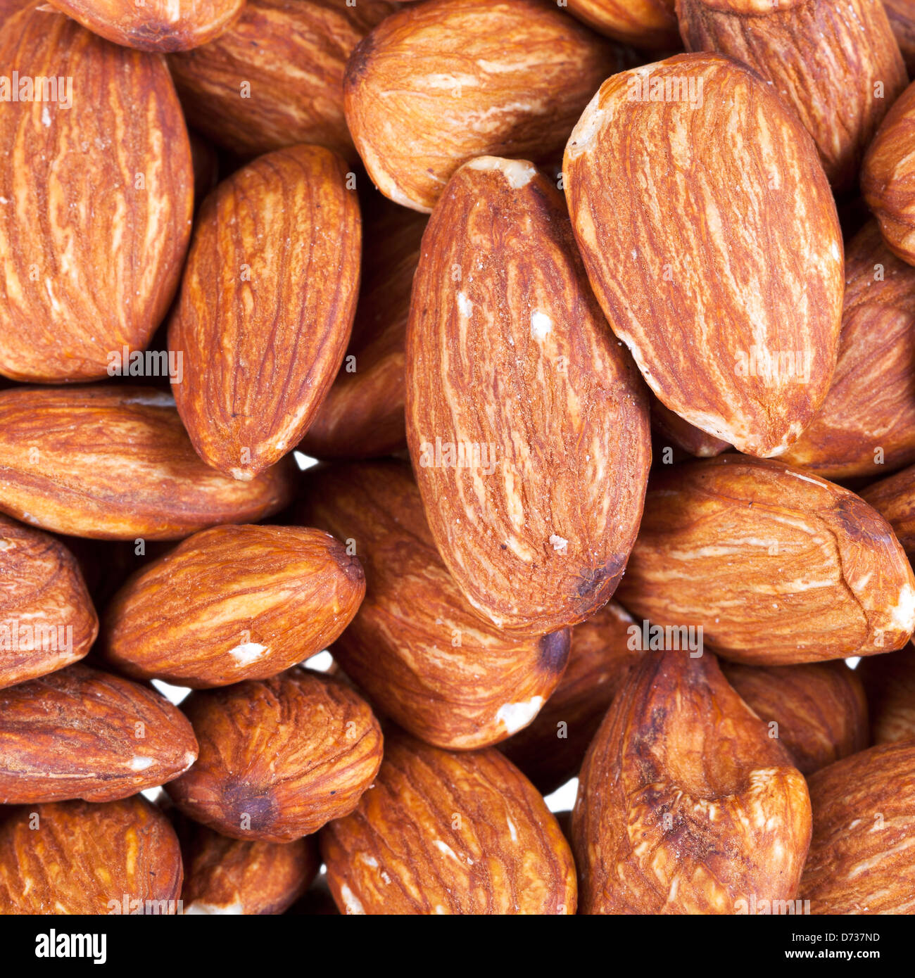 background from many almond nuts close up Stock Photo - Alamy