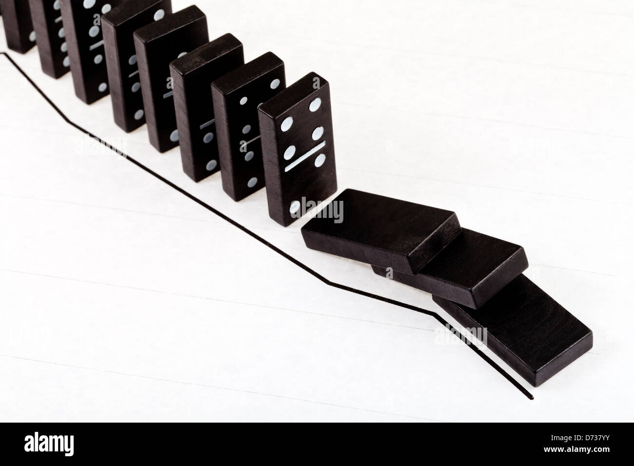 business concept - black domino and bad sales graph Stock Photo - Alamy