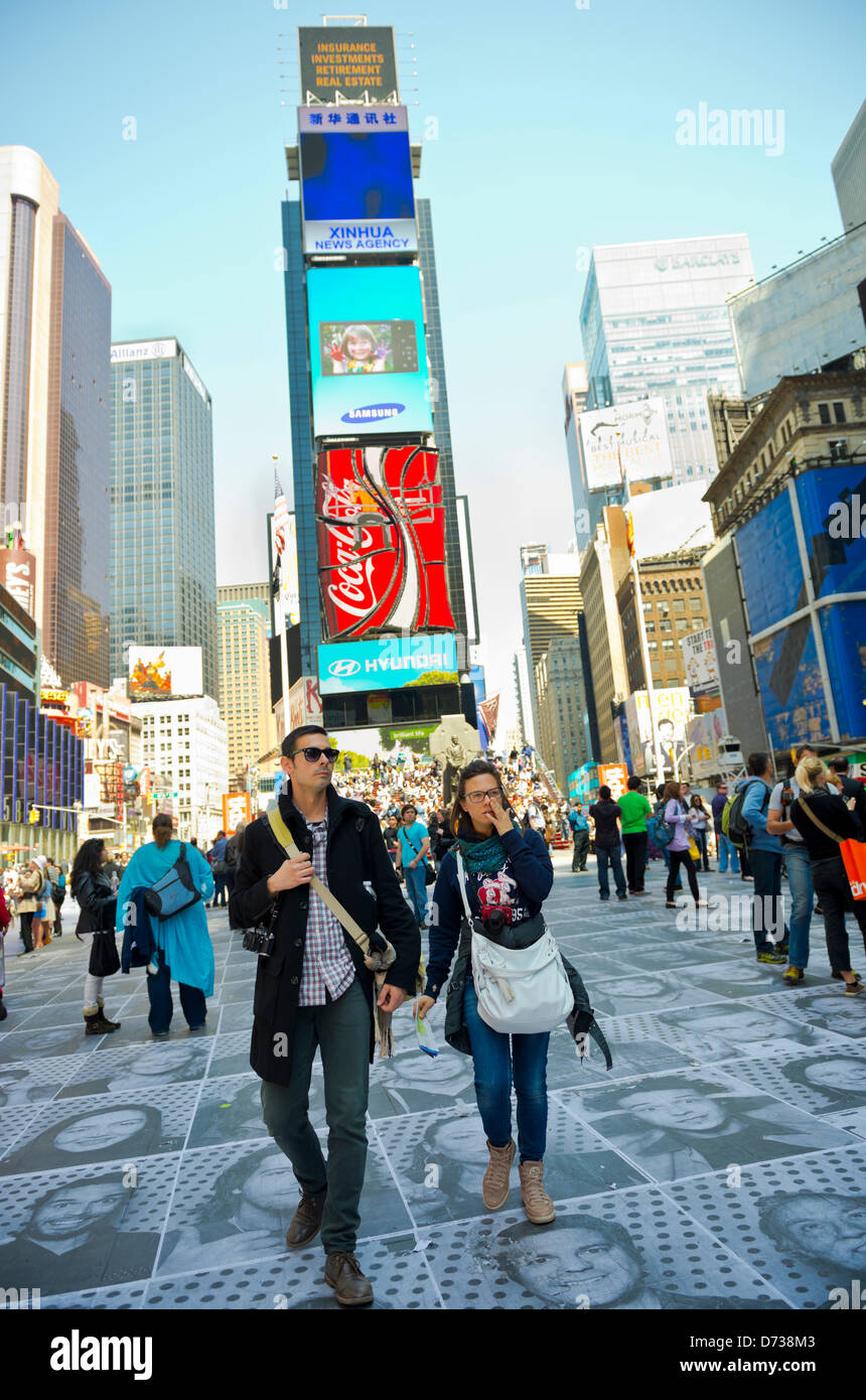 April 27, 2013 - Manhattan, New York, U.S. - Times Square visitors are ...