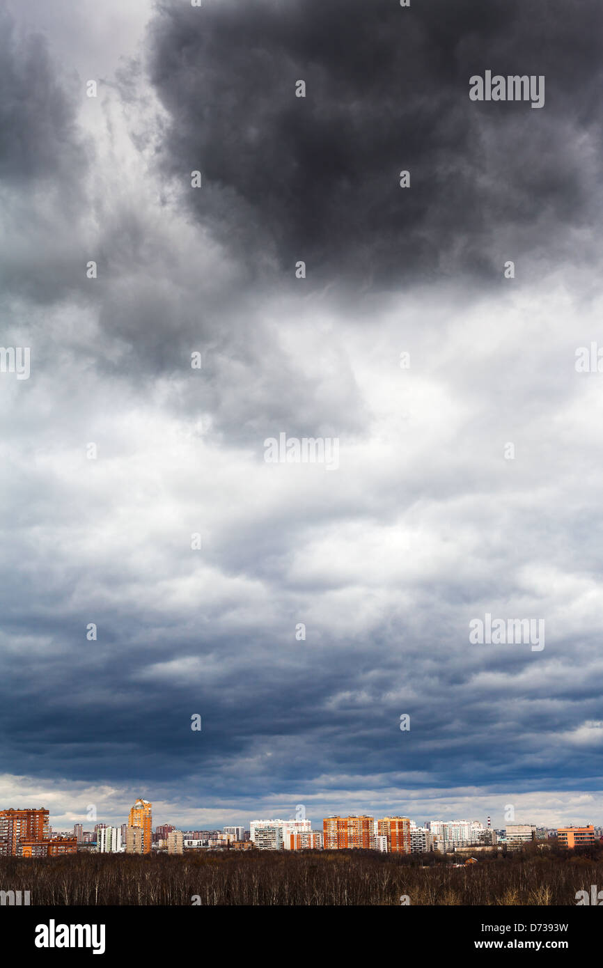 dark grey storm rainy clouds under city in spring Stock Photo - Alamy