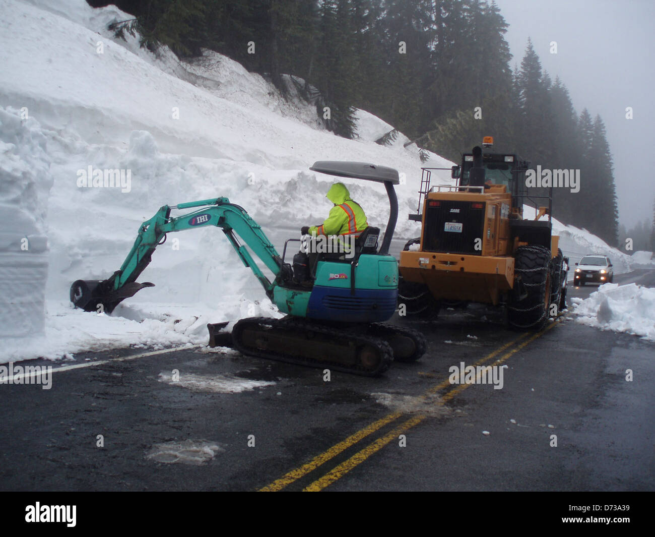 Sign installation and road maintenance activities are a part of the ...