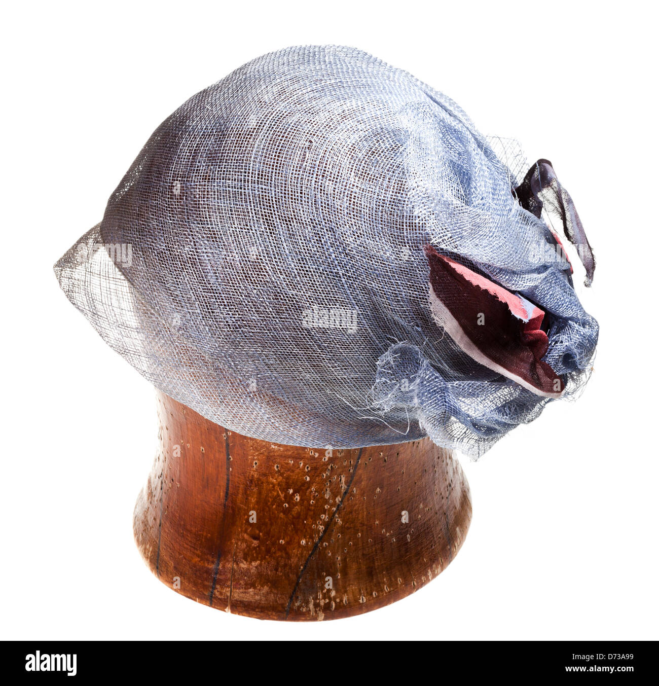 straw hat bonnet on wooden block isolated on white background Stock ...