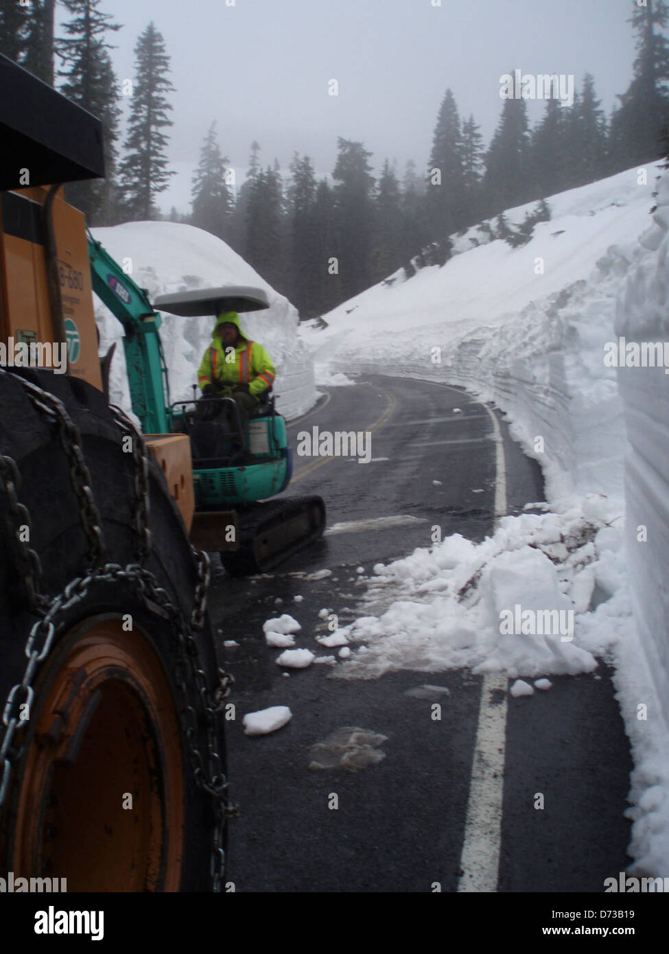 Sign installation on Cayuse Pass Highway 123 in Mount Rainier National ...