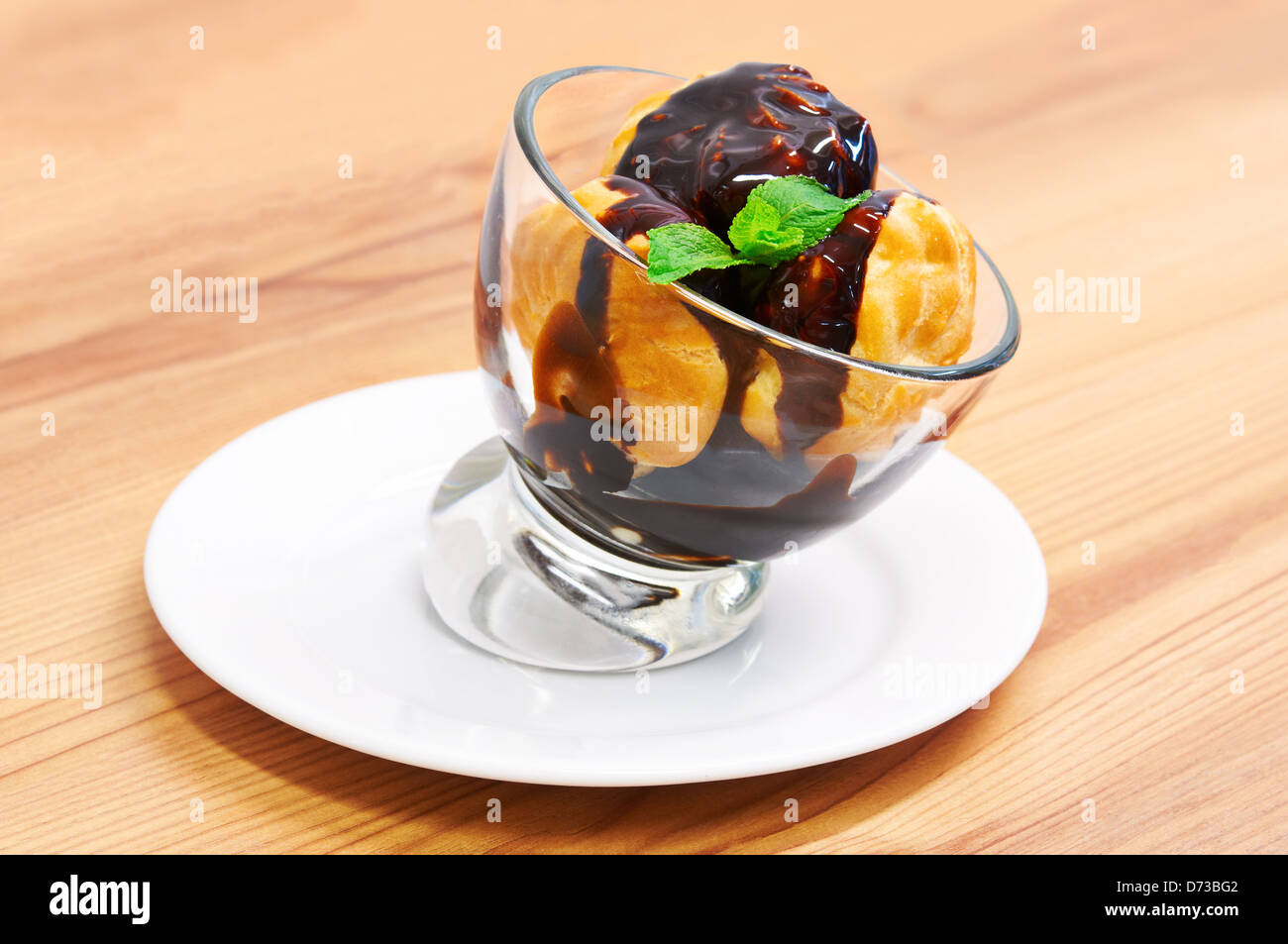 Profiterole in bowl chocolate hi-res stock photography and images - Alamy