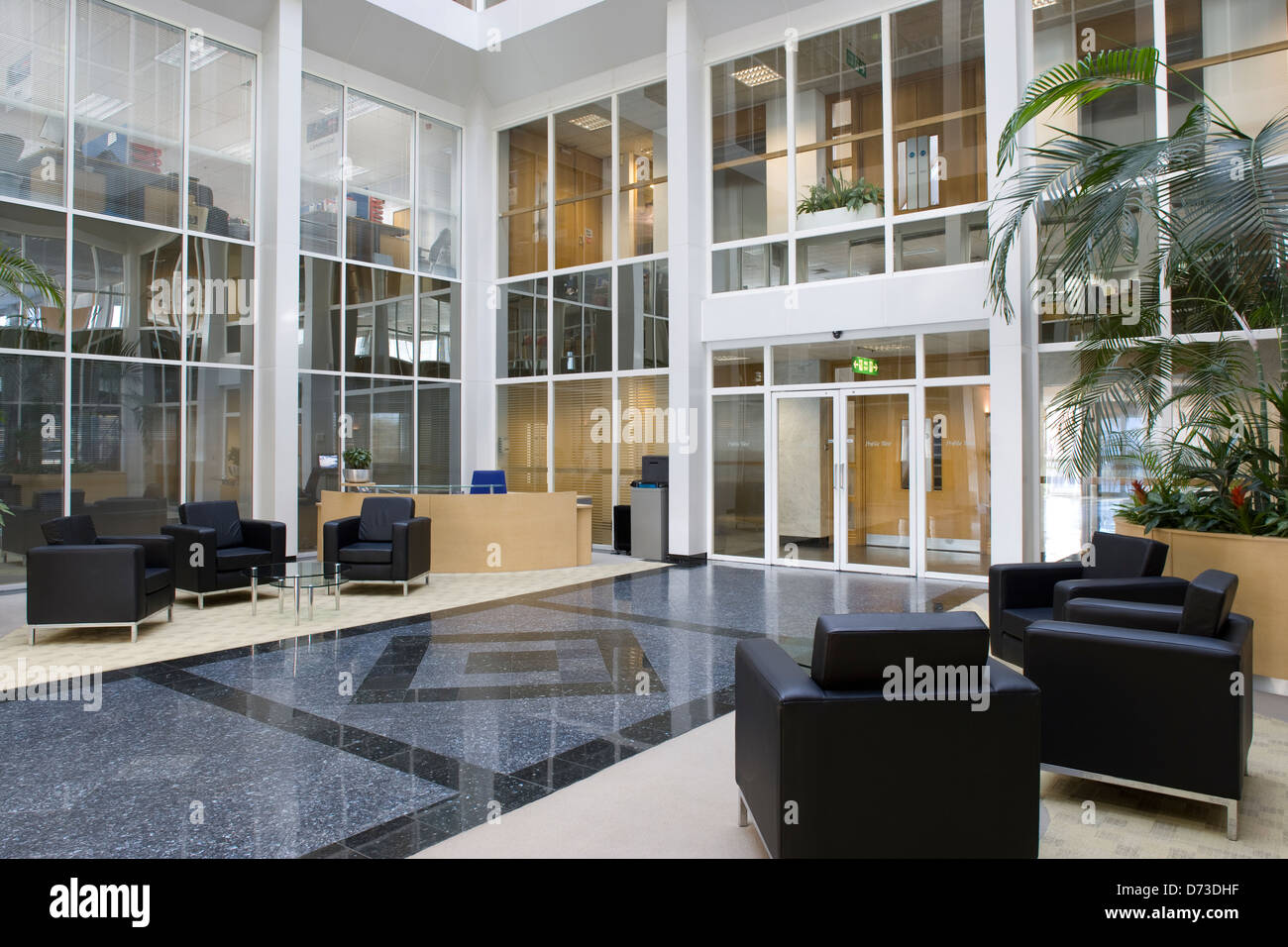 Office building atrium Stock Photo - Alamy