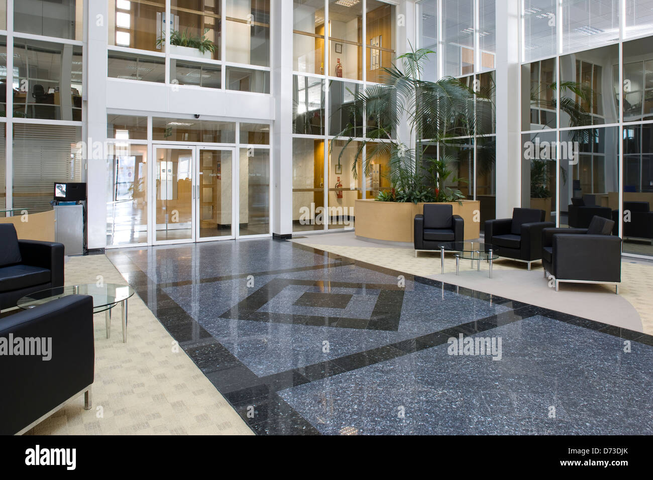 Office building atrium Stock Photo - Alamy