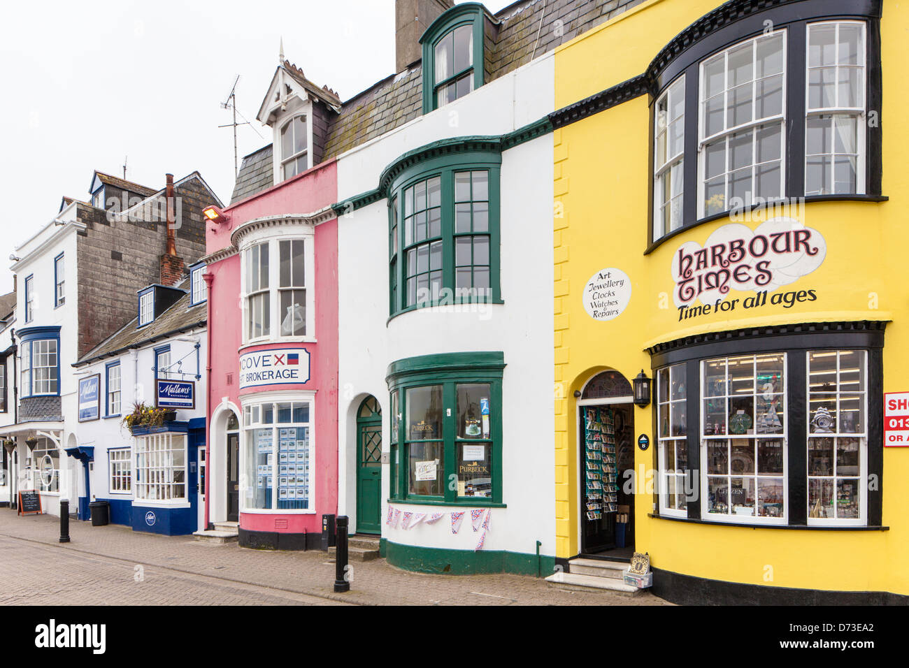 Brightly coloured shop fronts overlooking Weymouth Harbour, Dorset ...