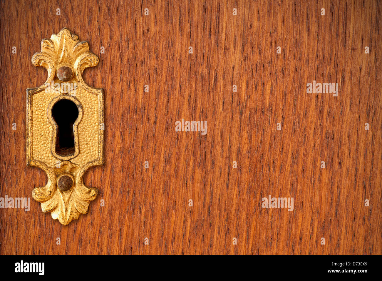 keyhole on wooden brown background or woodgrain texture Stock Photo - Alamy
