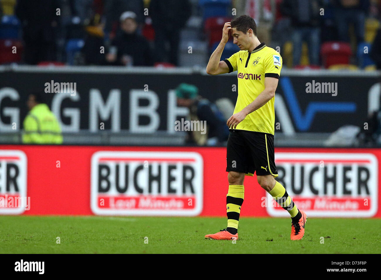Dortmund's Robert Lewandowski walks off the pitch after the Bundesliga ...