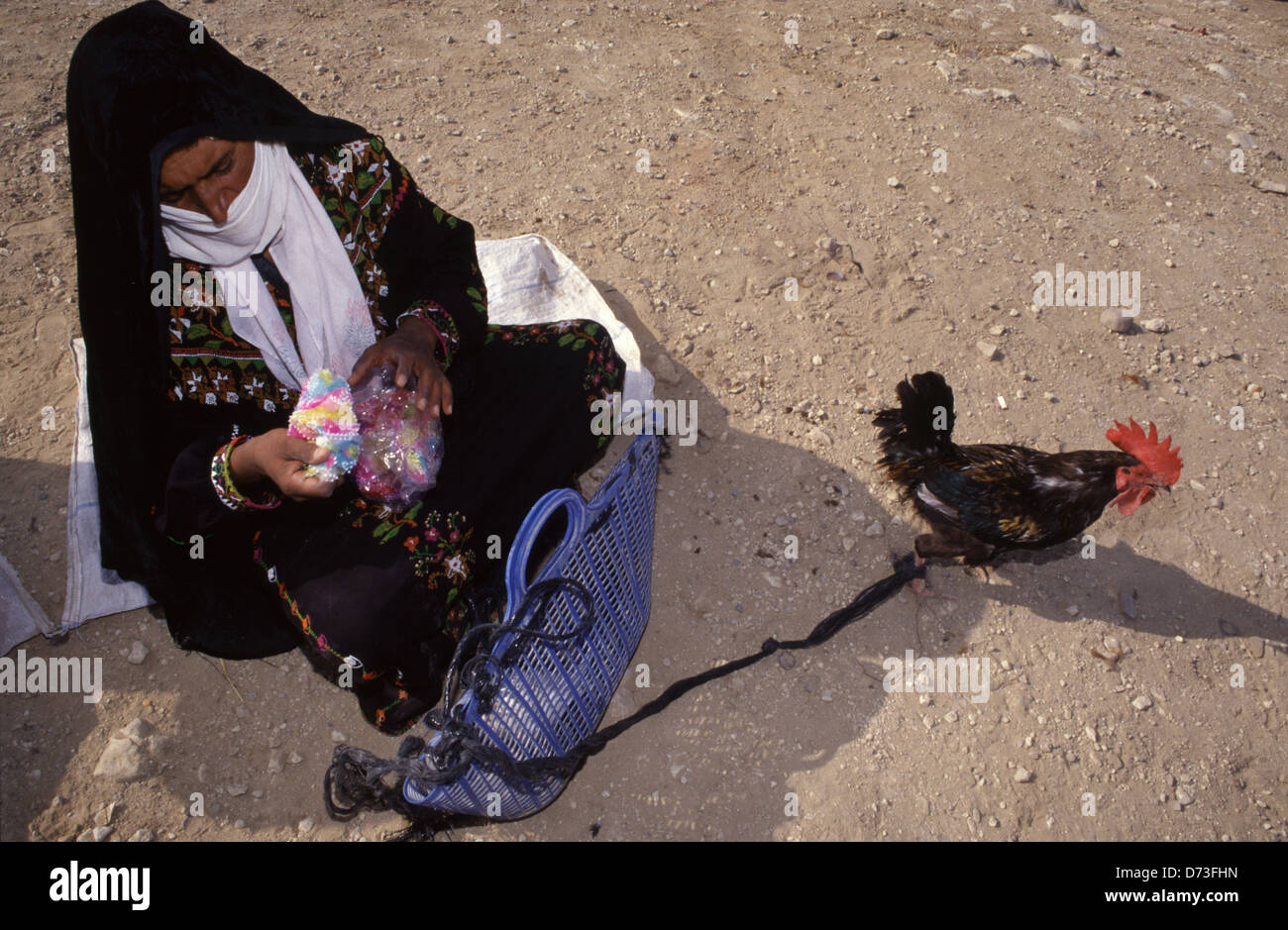 A Bedouin woman from the Tarabin tribe also known as Al-Tirabin sells ...
