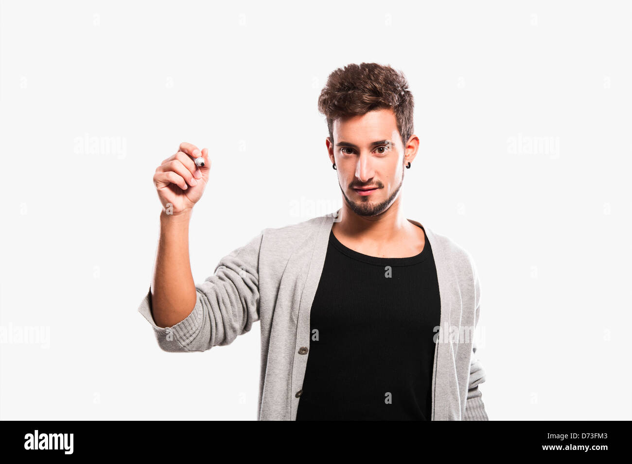 Portrait of a handsome young man writing something on a glass ...