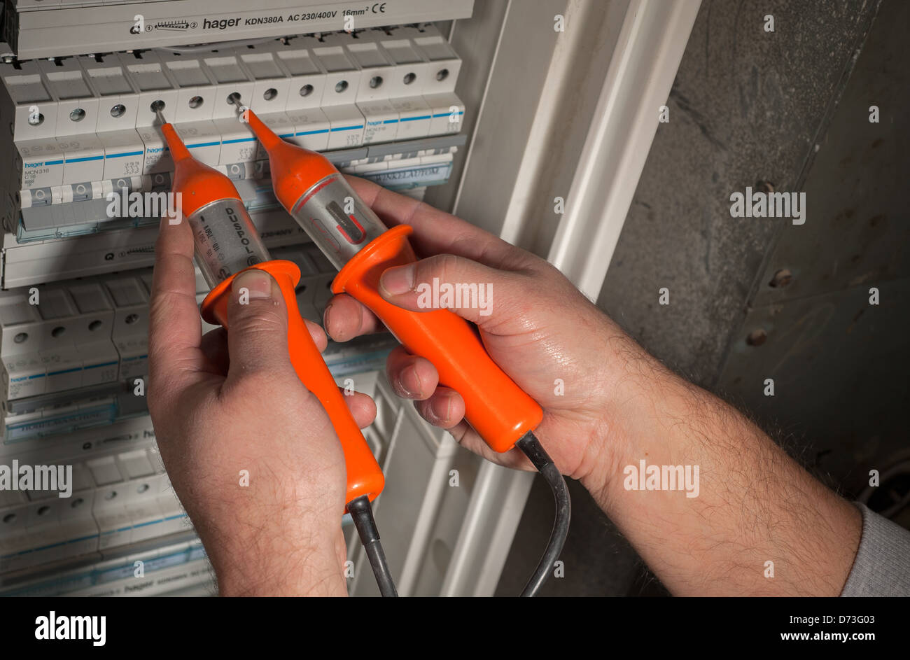 Berlin, Germany, a craftsman inspects a fuse box Stock Photo - Alamy