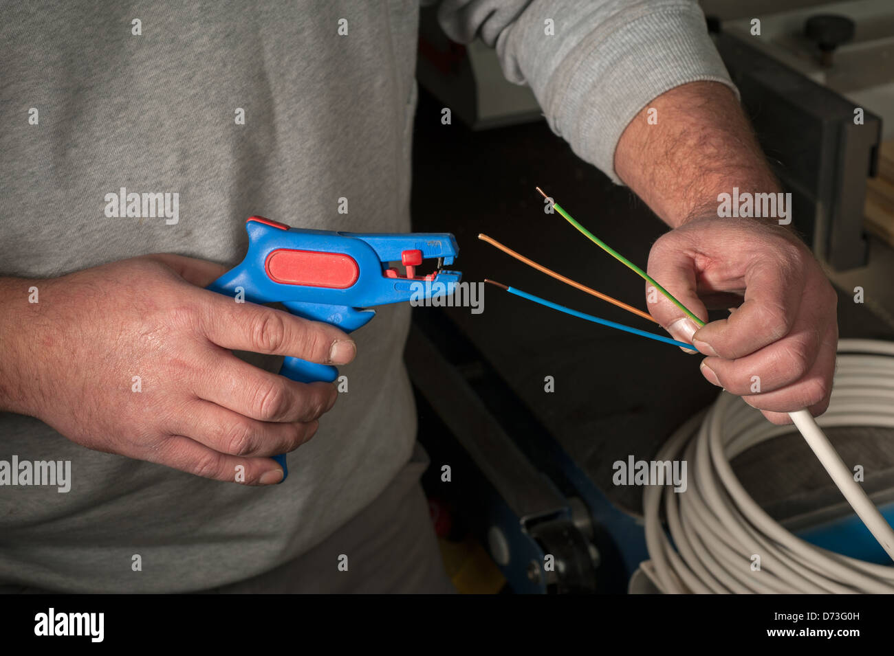 Remove wire insulation hi-res stock photography and images - Alamy