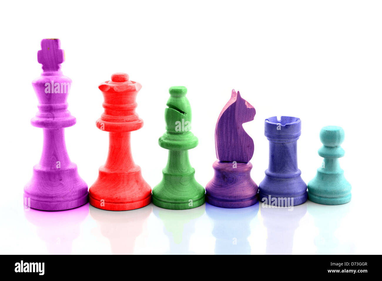 chess pieces in unusual colors reflected on a white background Stock ...