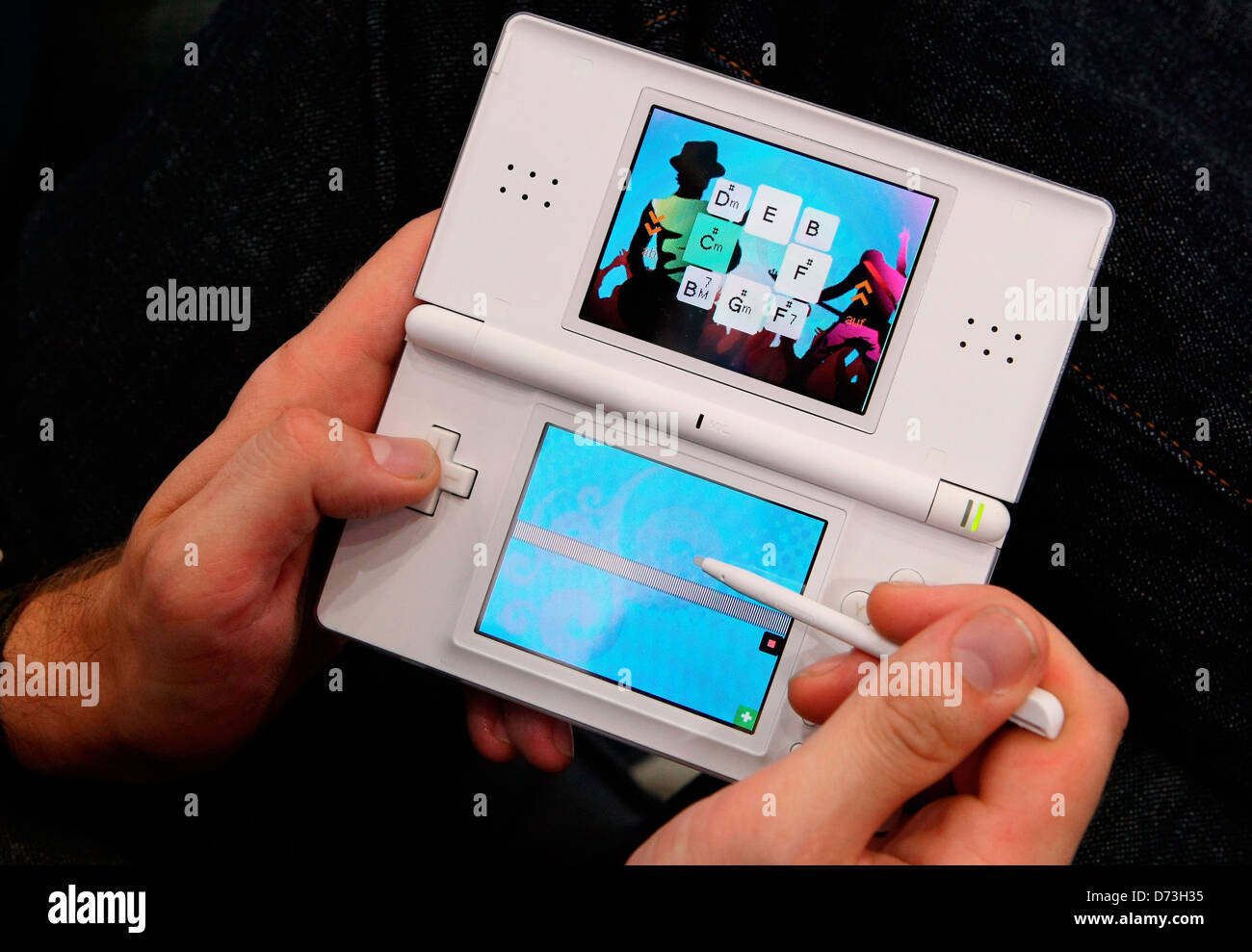 Nintendo ds lite hi-res stock photography and images - Alamy