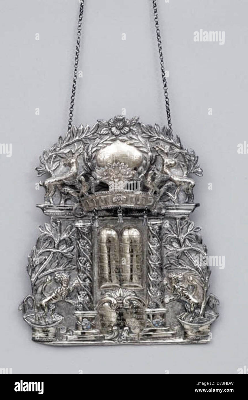 This Torah shield from Lvov, Ukraine, is a ceremonial object depicting ...