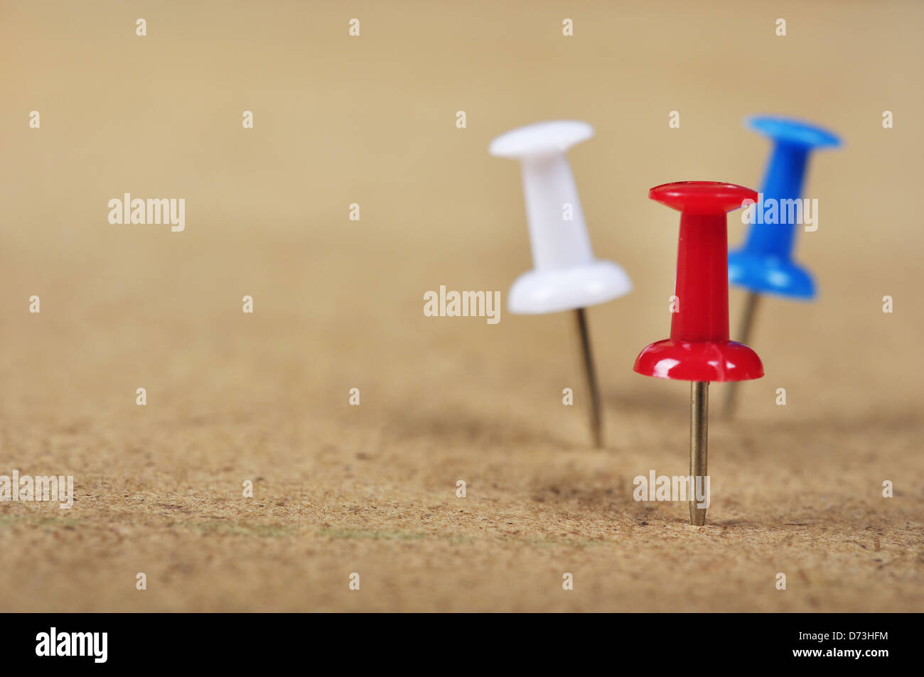 Pushpins on wooden background closeup. Small shallow DOF Stock Photo ...