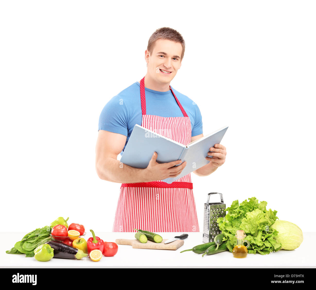 Male chef reading cookbook preparing hi-res stock photography and ...