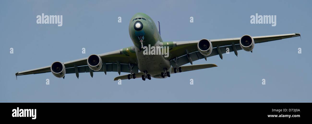 An unpainted Airbus A380 aircraft arrives at the Airbus production ...