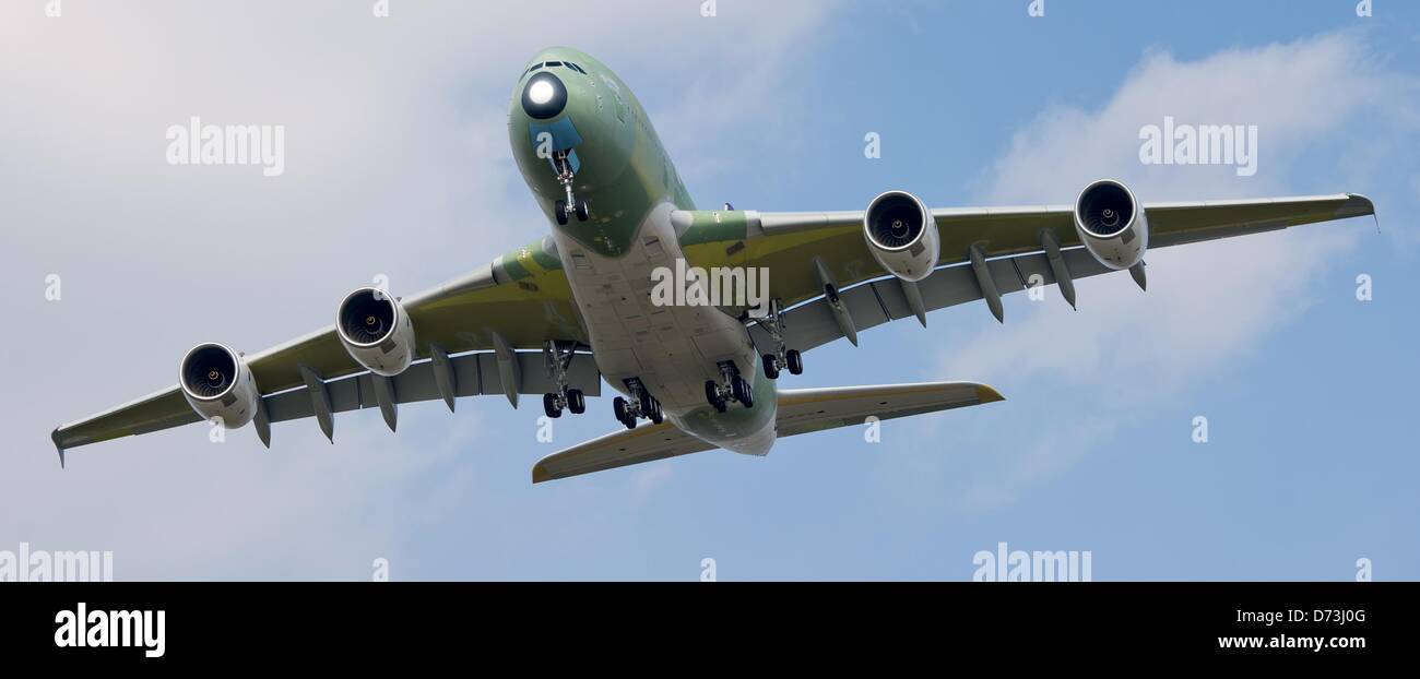 An unpainted Airbus A380 aircraft arrives at the Airbus production ...