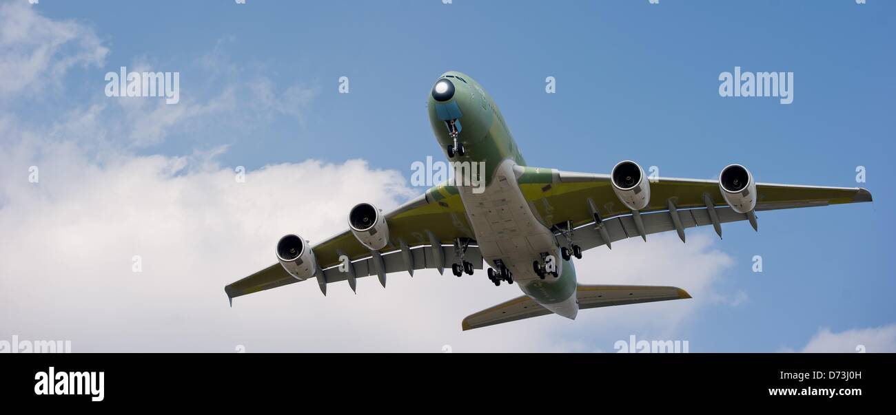 An unpainted Airbus A380 aircraft arrives at the Airbus production ...
