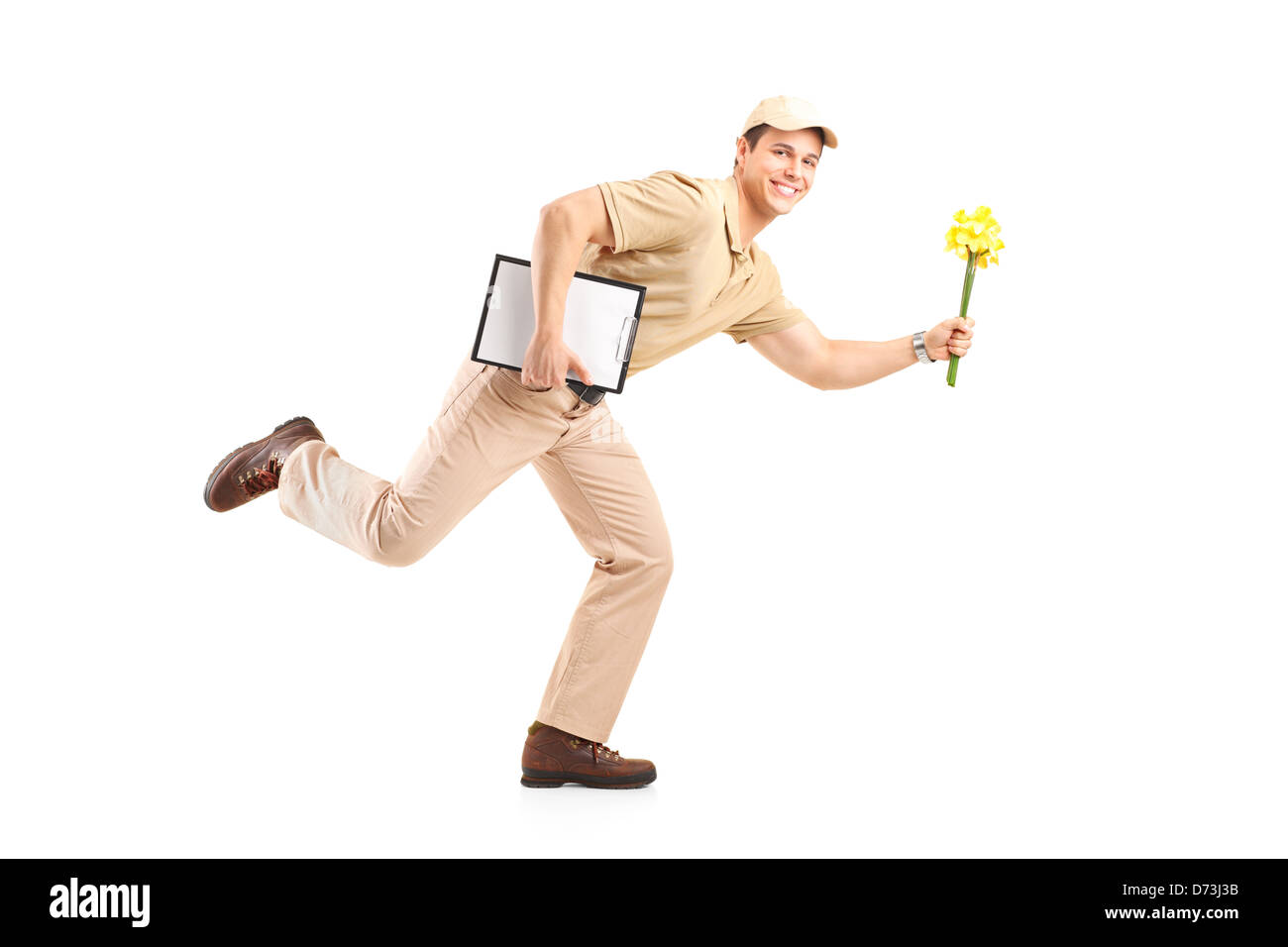 Full length portrait of a mailman delivering flowers, isolated on white ...