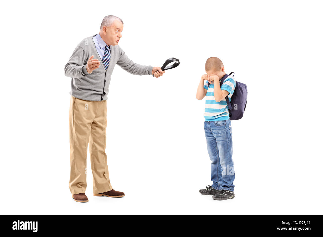 Full length portrait of an angry grandfather holding a belt and ...