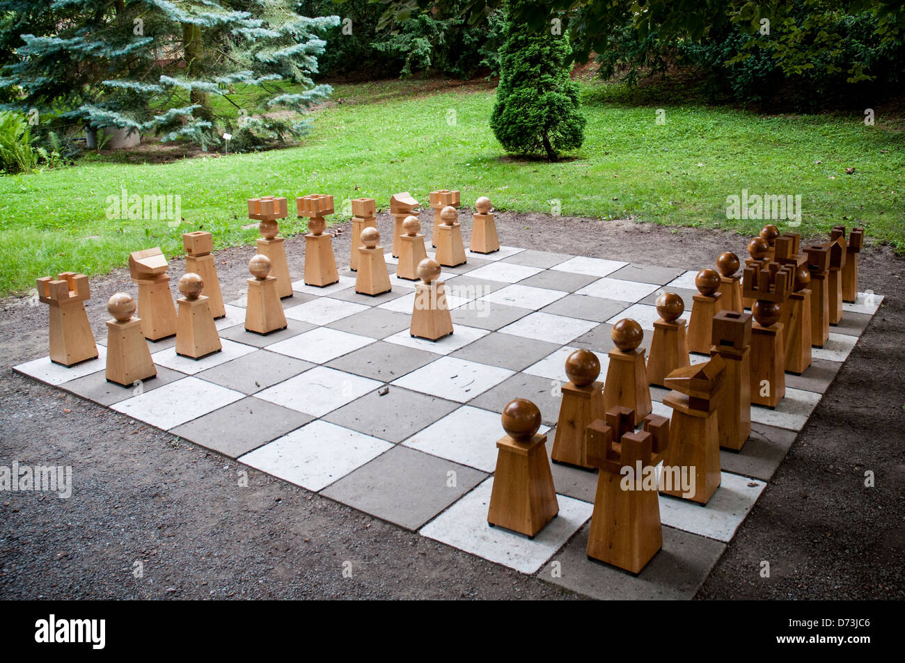 Giant wooden chess set in the park Stock Photo - Alamy
