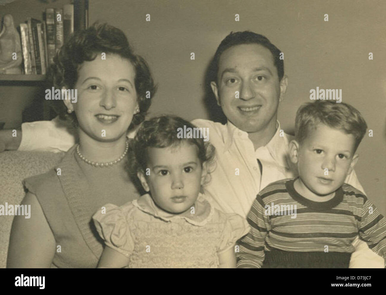 A photograph from October 1951 capturing a family of the 1950s. The ...
