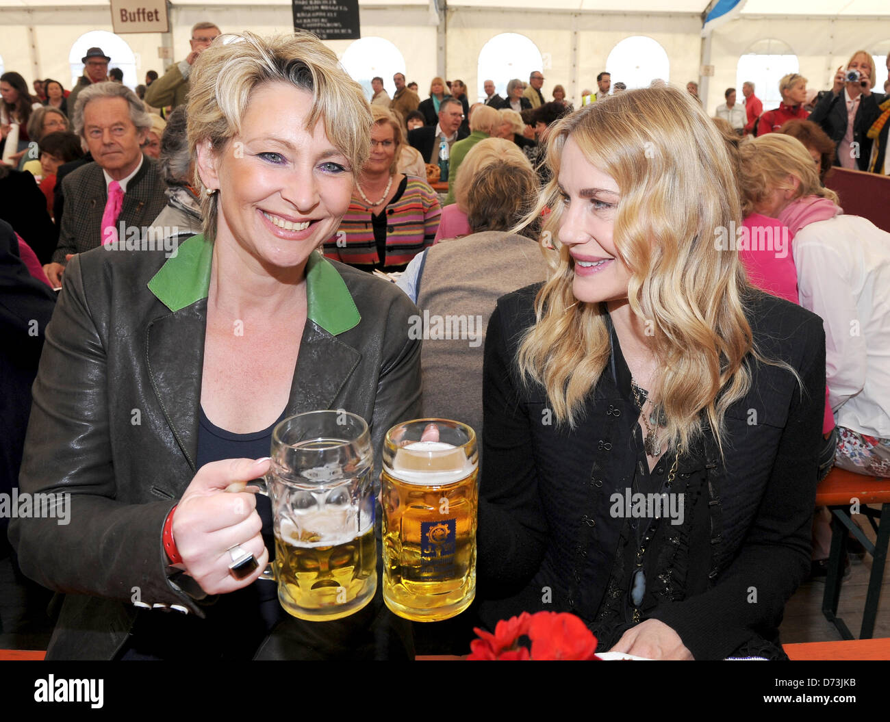 US actress Daryl Hannah (R) and German singer Claudia Jung toast with ...