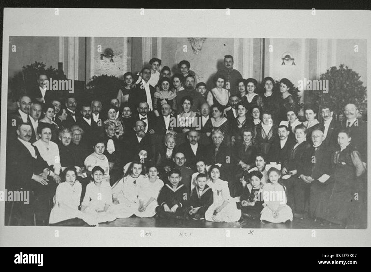 The Becker family wedding anniversary celebration portrait includes ...