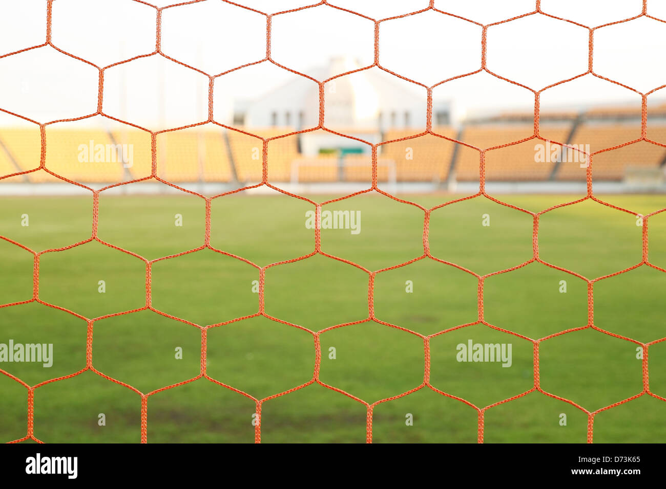 red net soccer goal football and green grass field in stadiun Stock ...