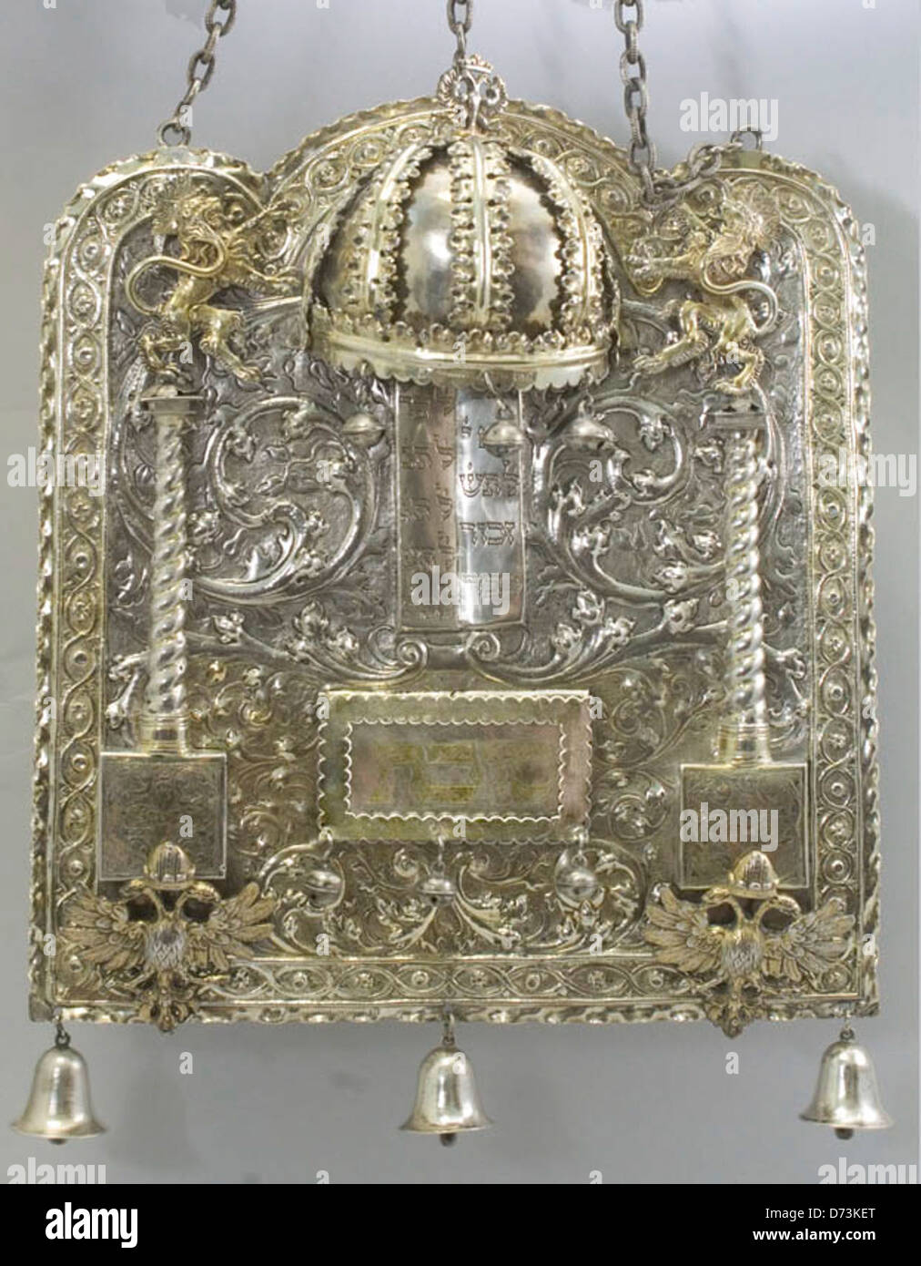 This photograph features a Torah shield, a ceremonial object used in ...