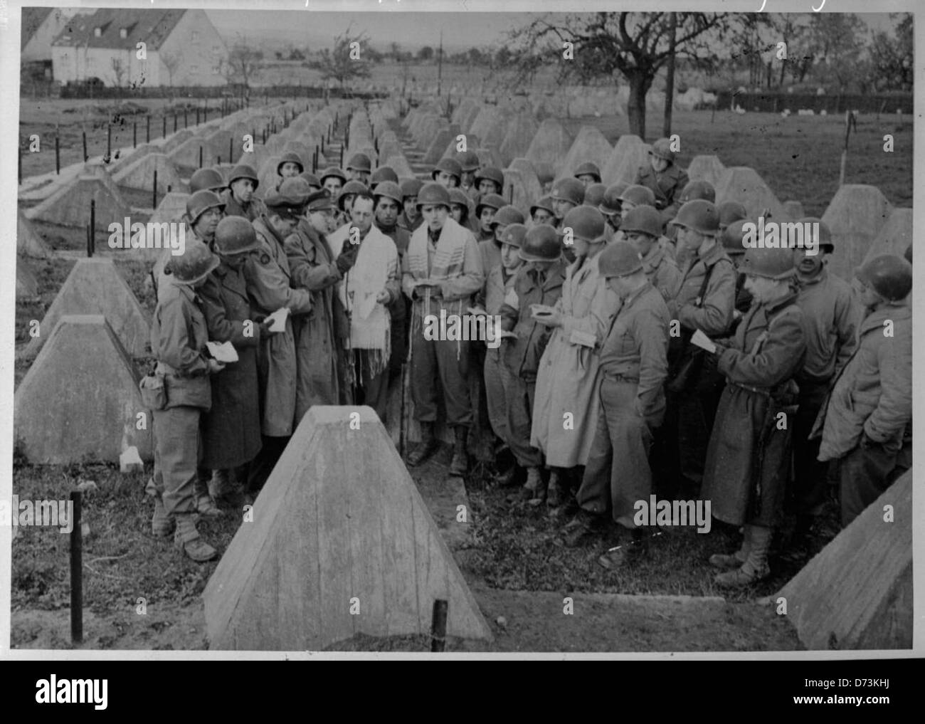 In this 1945 image, Chaplain Sidney Lefkowitz conducts religious ...