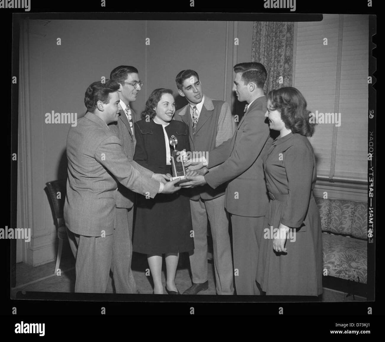 This photograph shows a trophy awarded to winners of competitive events ...