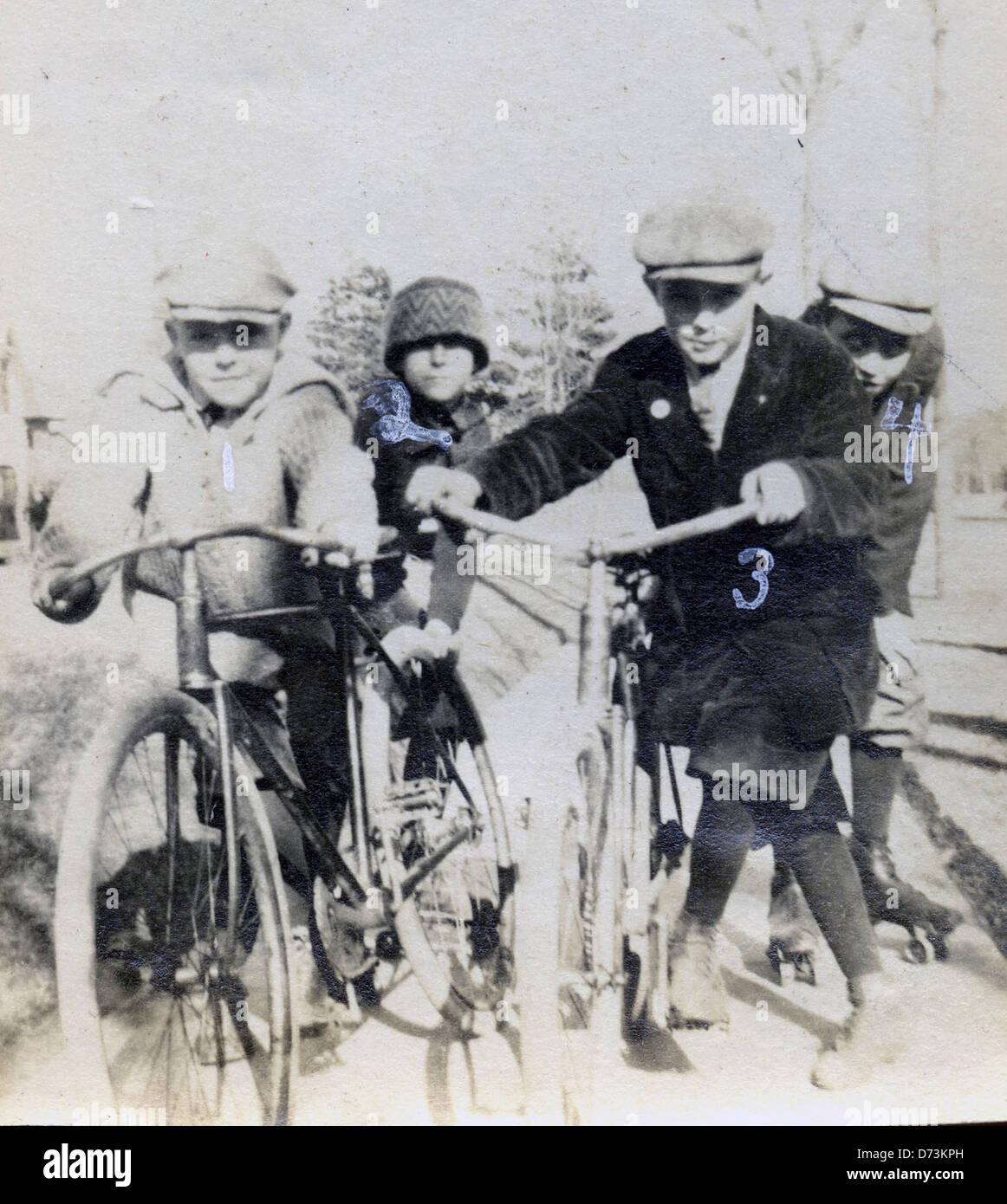 Boys on bicycles from Agrant family photograph Stock Photo - Alamy