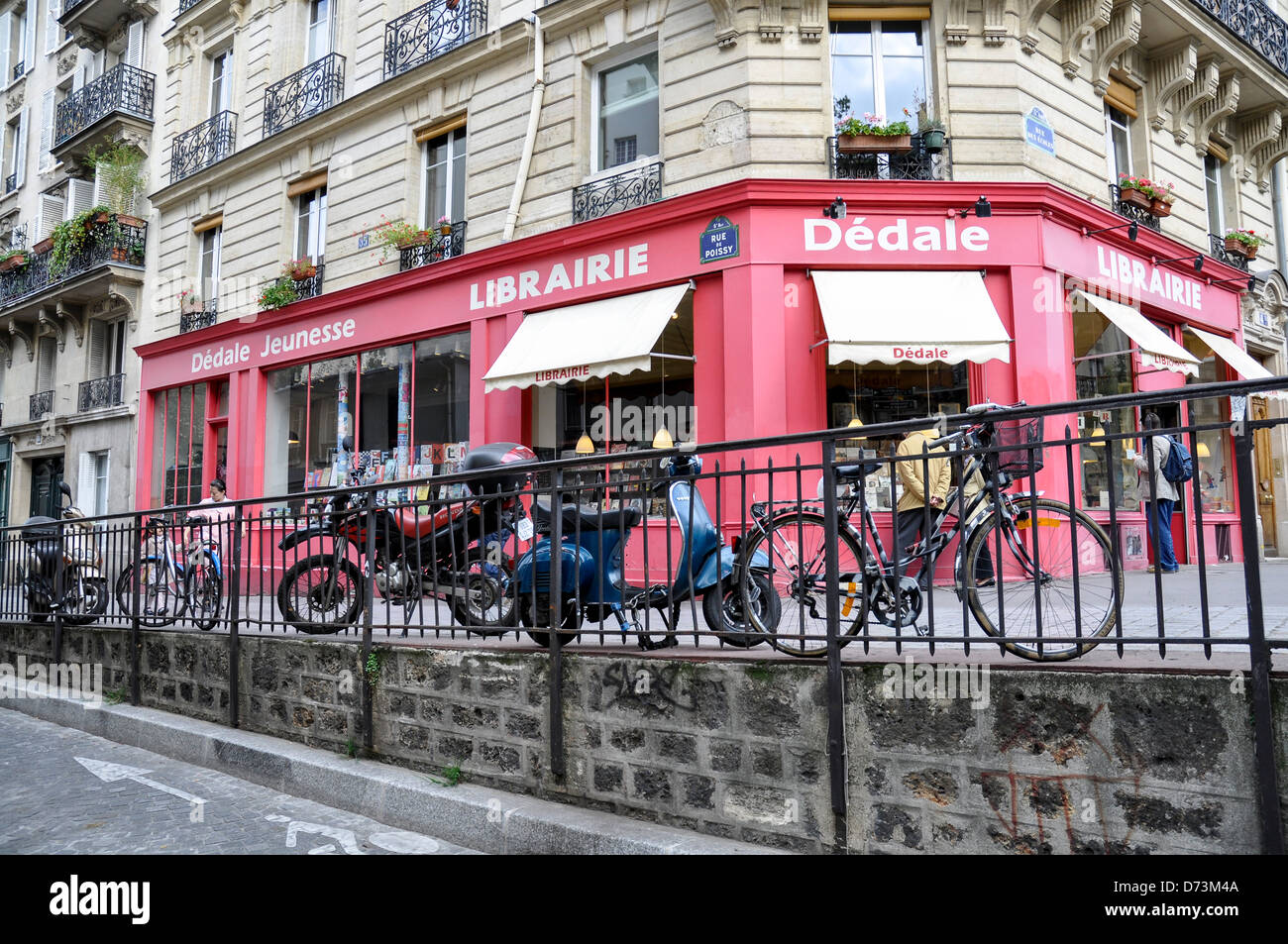 Atmosphere of the streets of Paris, France. Red corner shop Stock Photo ...
