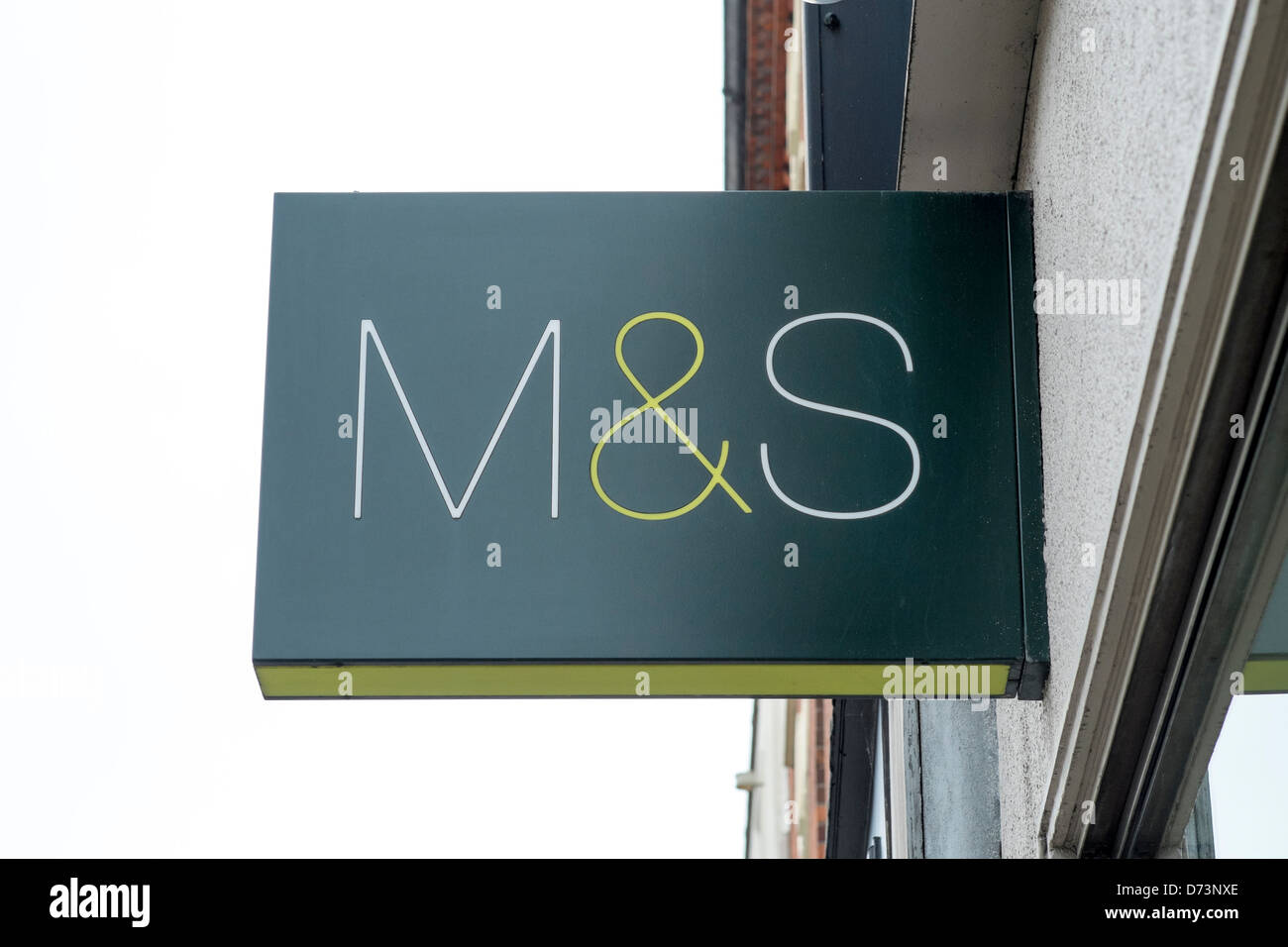 Looking up at a Marks and Spencer department store sign and logo Stock ...