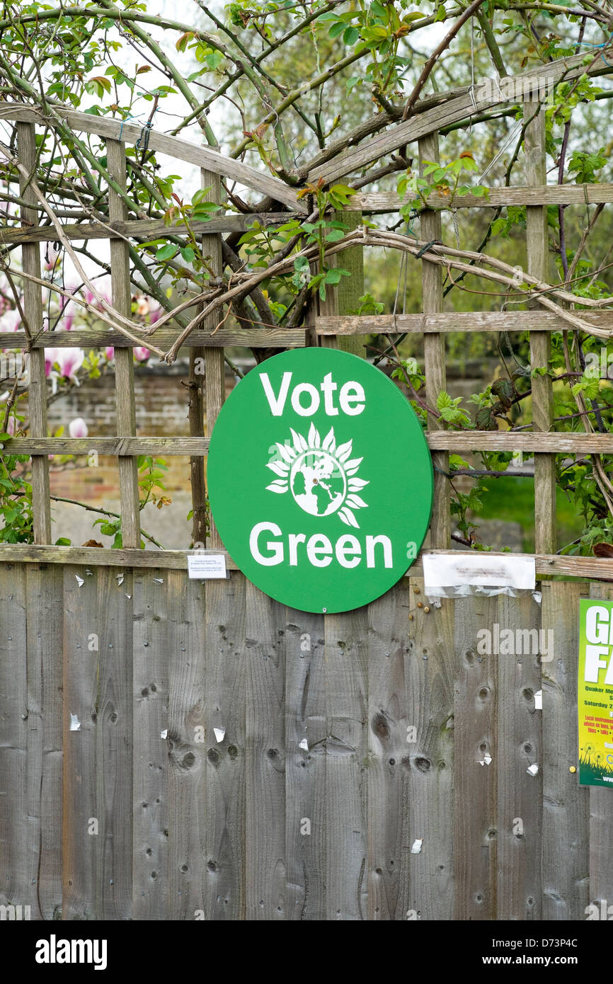 Circular Vote Green Party sign attached to a wooden fence Stock Photo ...