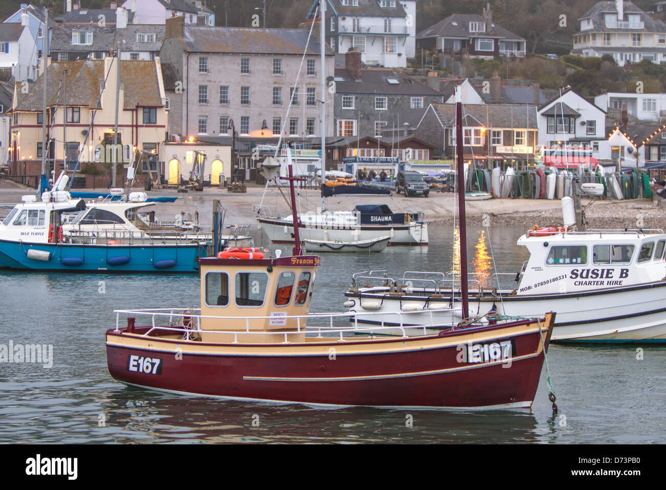 Lyme Regis Harbour in evening light, Lyme Bay, Dorset, England, UK ...
