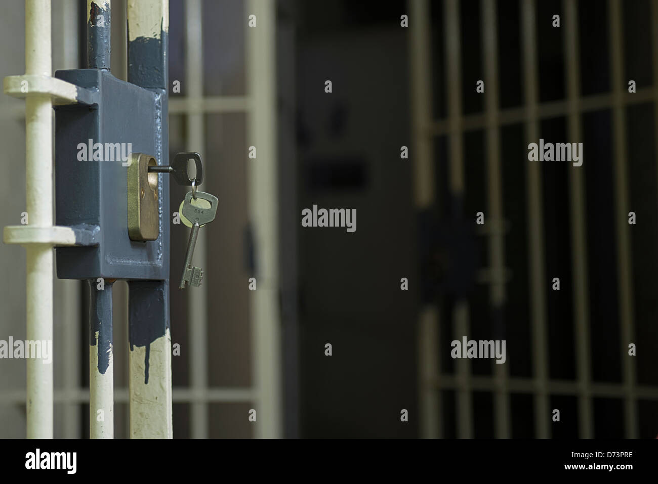 Prisoner behind bars hi-res stock photography and images - Alamy