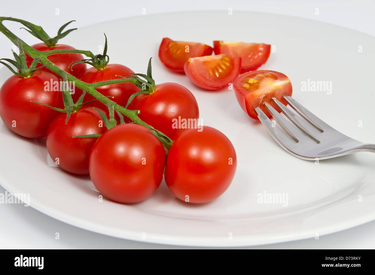 Wet tomato on plate hi-res stock photography and images - Alamy