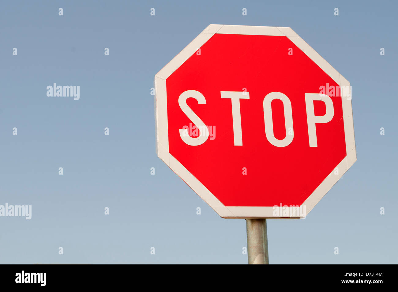 Stop sign against blue sky hi-res stock photography and images - Alamy