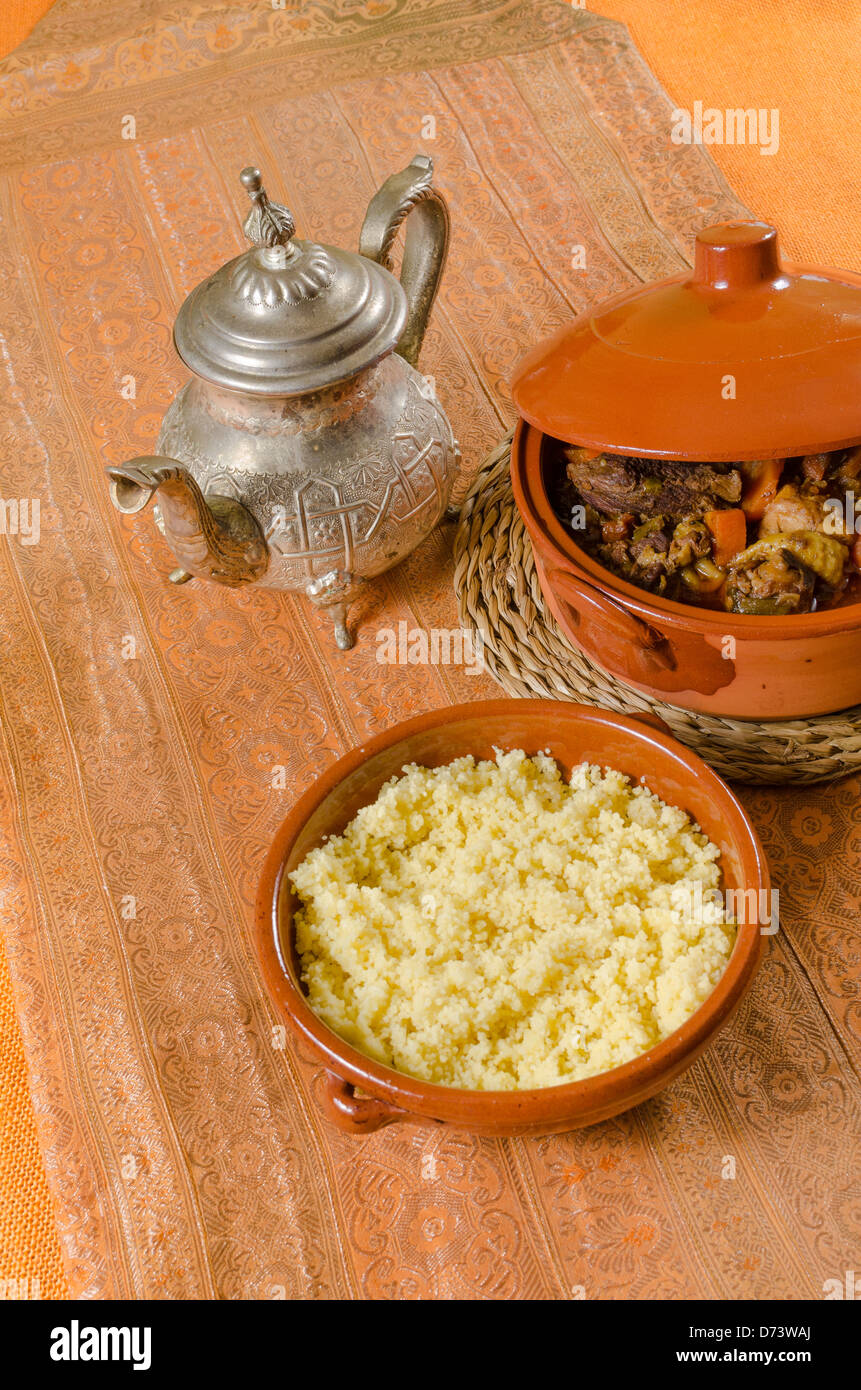 Traditional couscous served in classic clay pots Stock Photo - Alamy