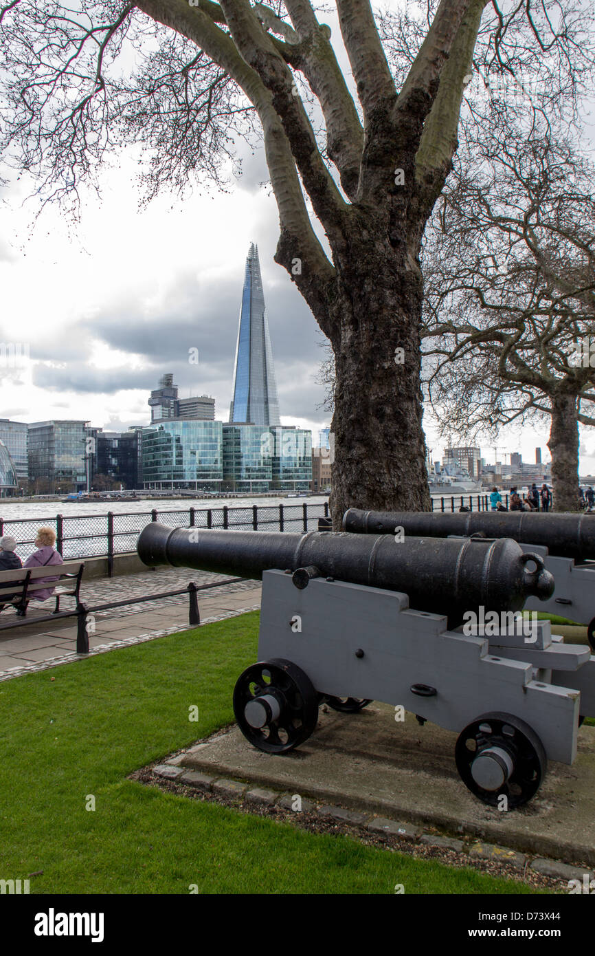 Cannon near the Tower of London looking towards The Shard Stock Photo ...