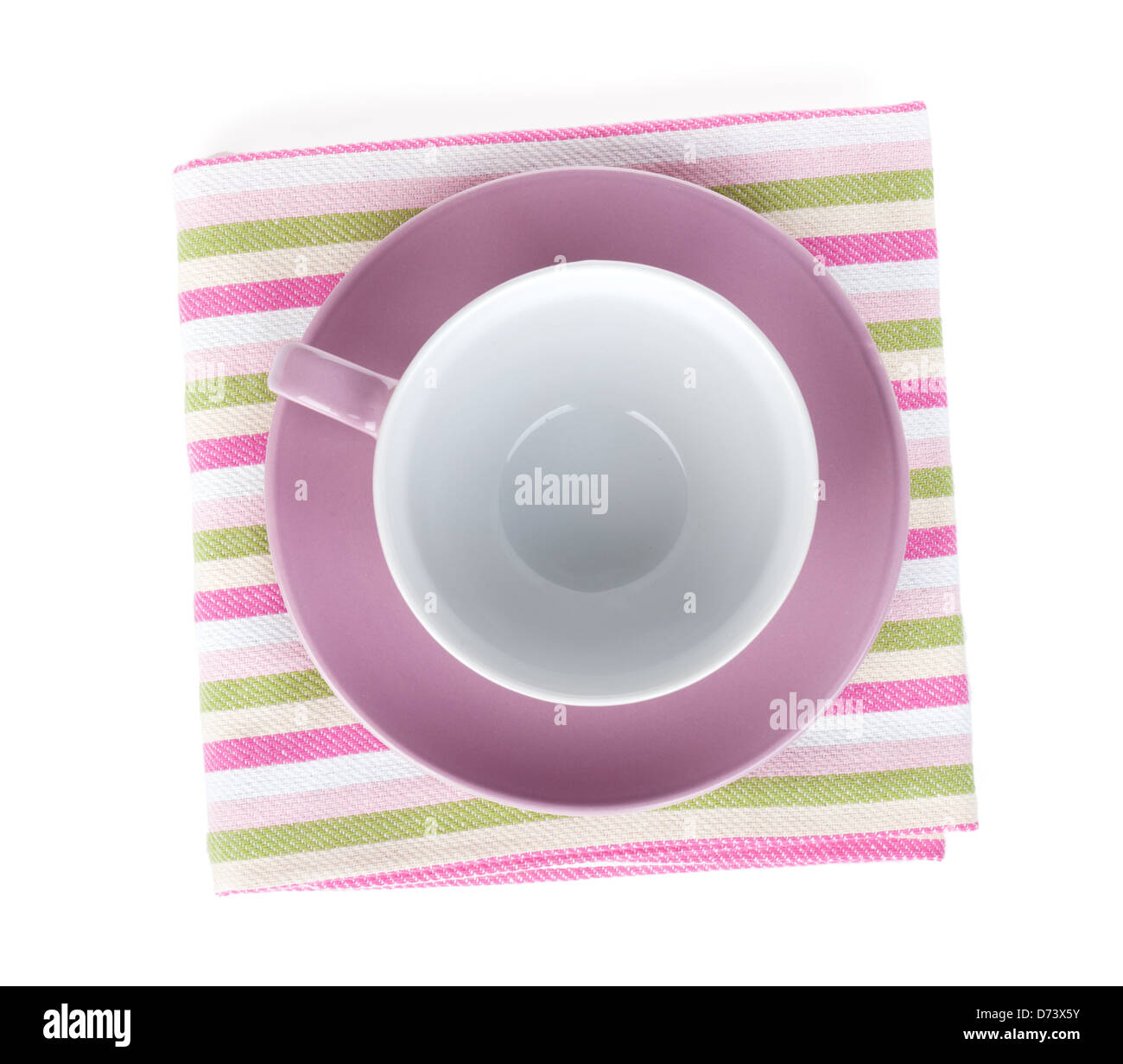 Violet coffee cup over kitchen towel. Isolated on white background ...