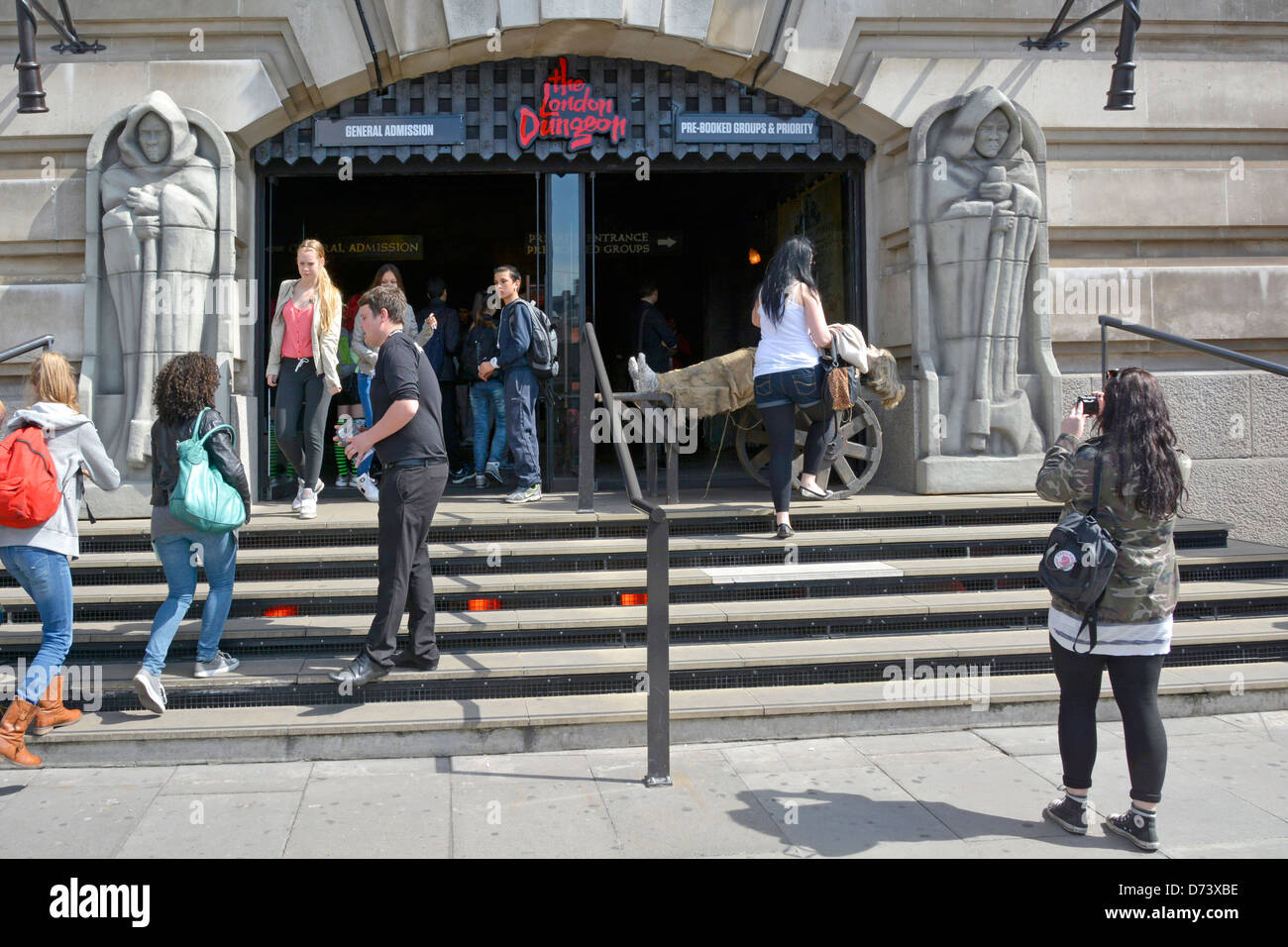 Tourists outside the New London Dungeon entrance on the South Bank run ...